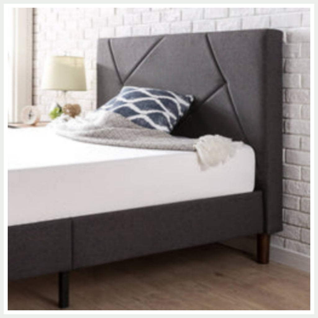 Grey upholstered bed